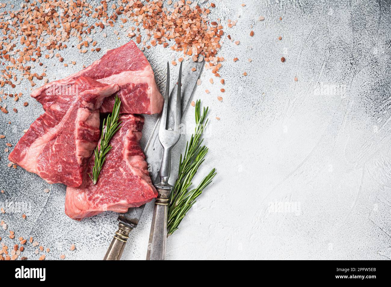 Silverside sirloin beef cut, raw meat on butcher table with herbs ...