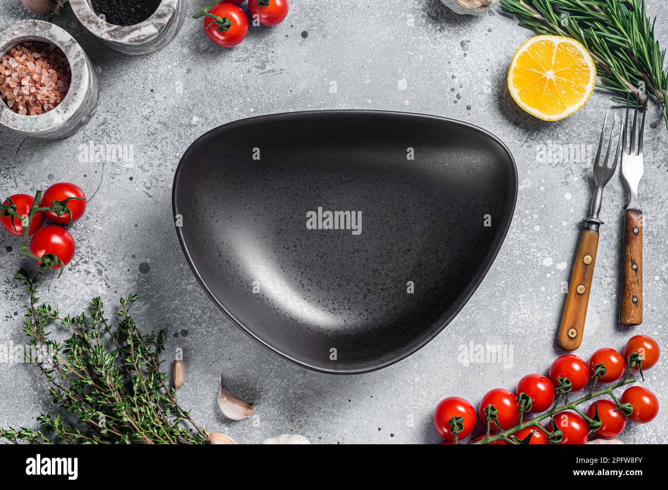 Food cooking and healthy eating background with empty rustic plate and ...