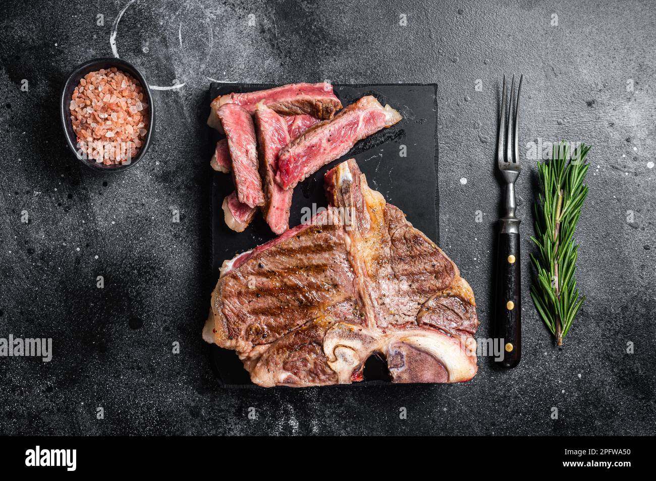 T bone grilled beef meat Steak, cooked Porterhouse on a marble board ...