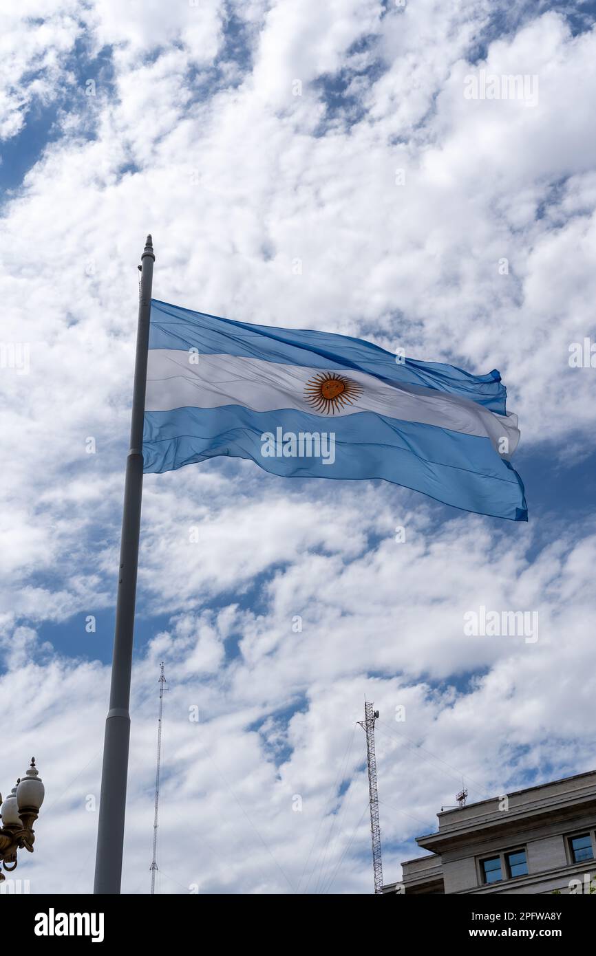 The national flag of the Argentine Republic with blue sky and white ...