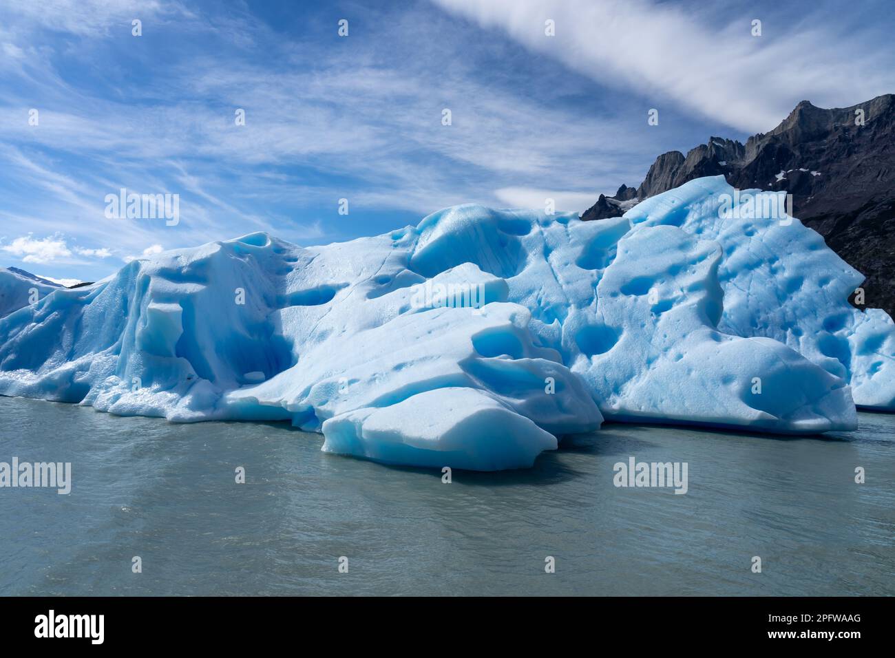A large iceberg that broke off from the Grey Glacier in Torres del ...