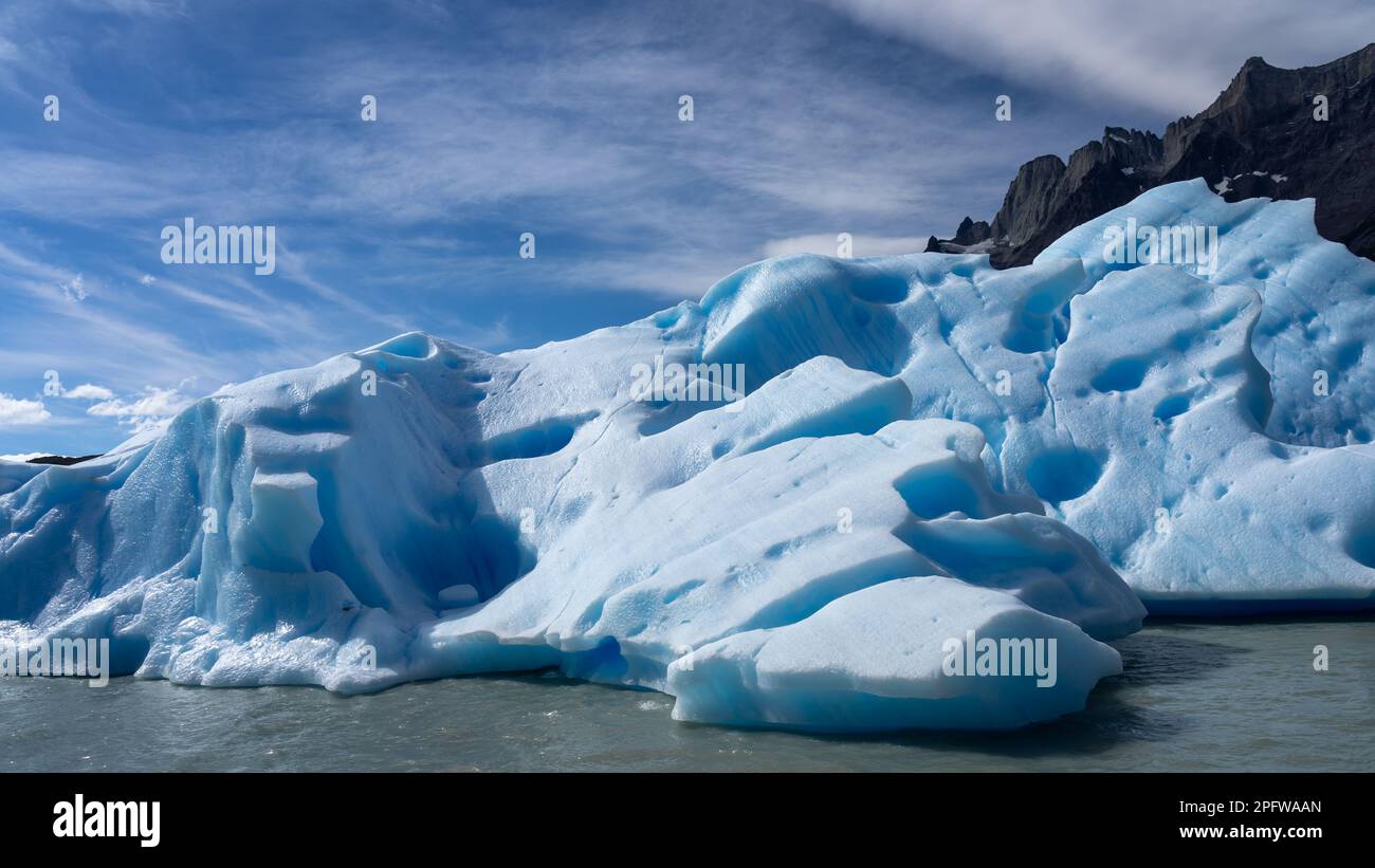 A large iceberg that broke off from the Grey Glacier in Torres del ...