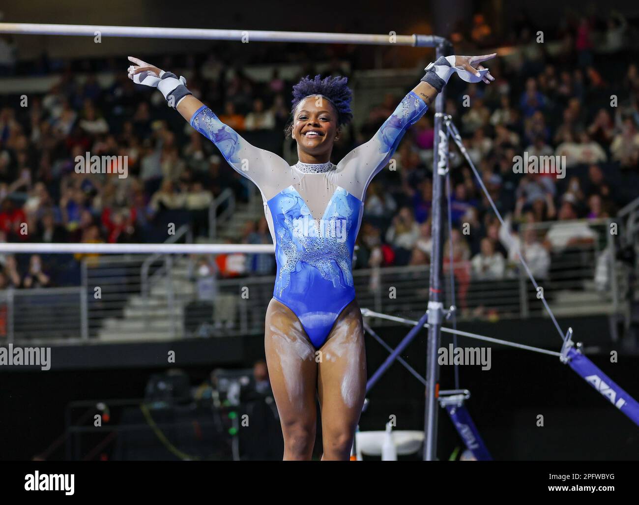 March 18, 2023: Florida's Trinity Thomas smiles as she lands her bar ...