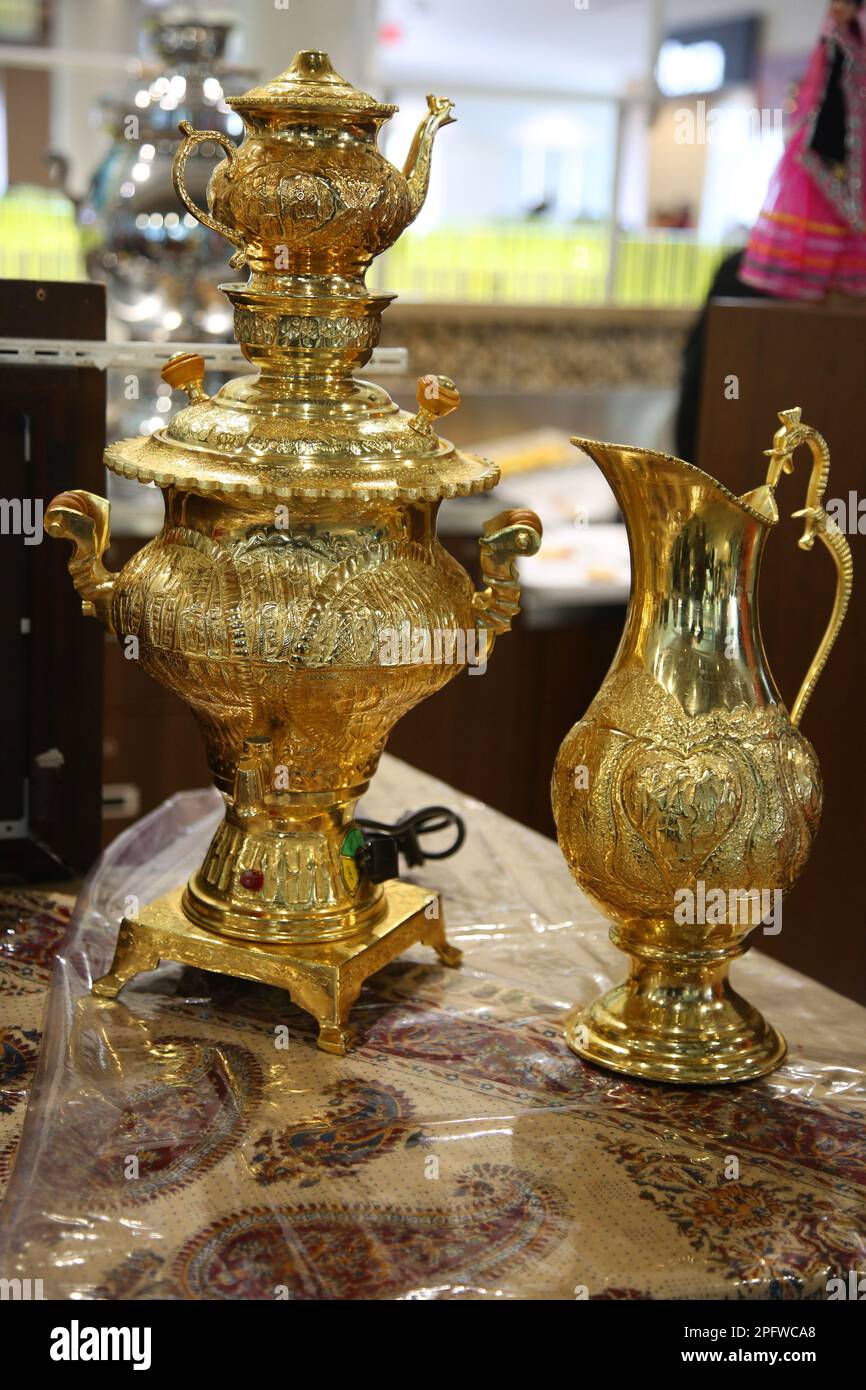 Traditional Iranian samovar filled with tea during Nevruz celebrations ...