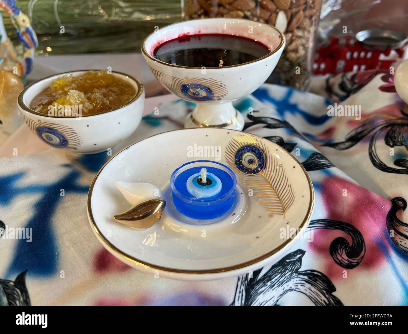 Traditional items adorn a Haft Sin (Haft Seen) (an arrangement of seven ...