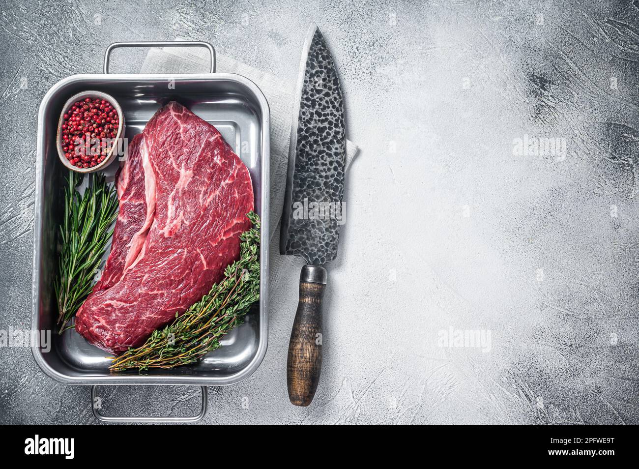 Butcher tray with raw top sirloin beef meat steak. White background ...