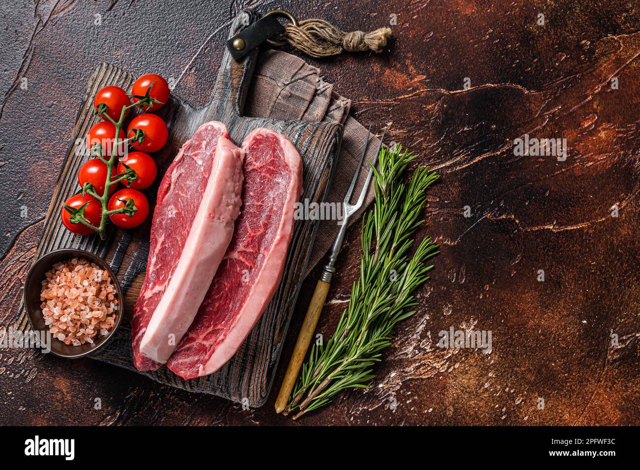 Raw Picanha meat steak, traditional Brazilian beef cut with thyme ...