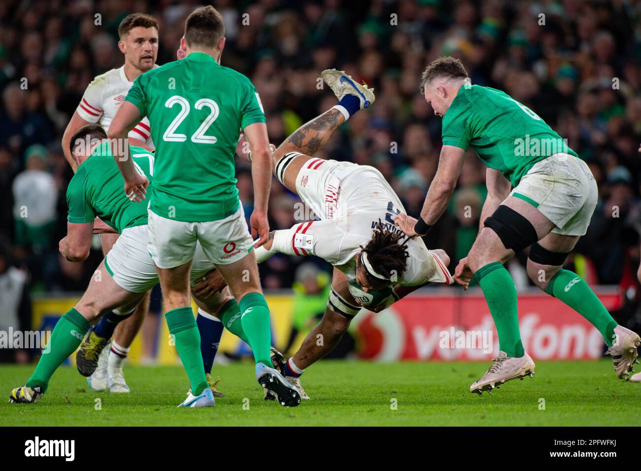 Dublin, Ireland. 19th Mar, 2023. Lewis Ludlam of England tackled by ...