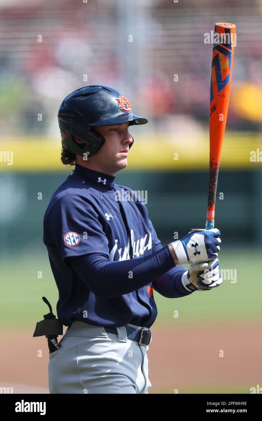The Plate. 18th Mar, 2023. Kason Howell #5 of Auburn looks over his bat ...
