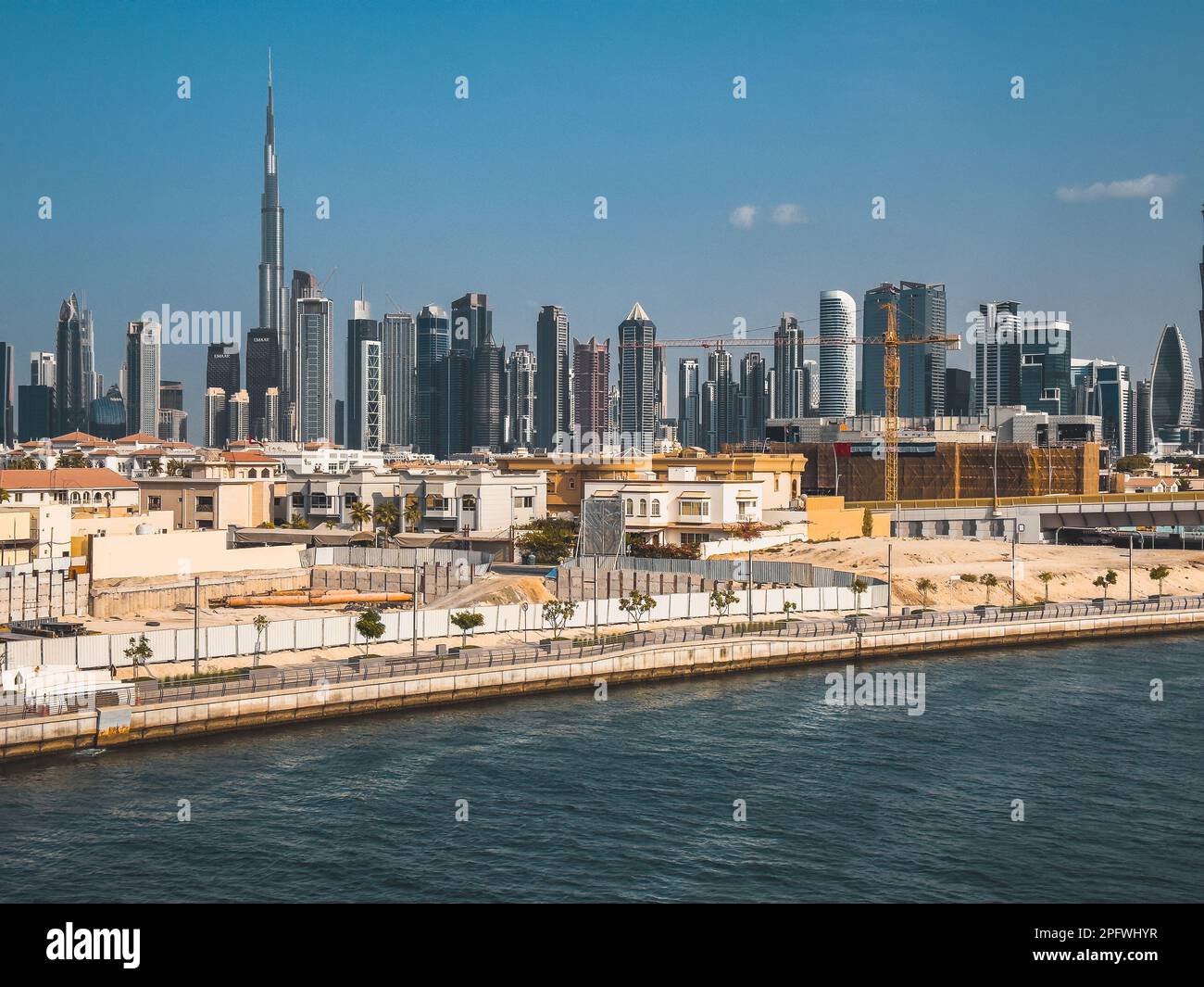 Dubai Water Canal Tolerance Bridge, pedestrian bridge with water taxi ...