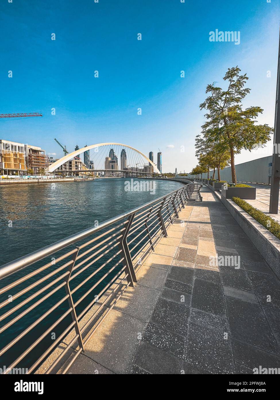 Blue arch bridge dubai water hi-res stock photography and images - Alamy