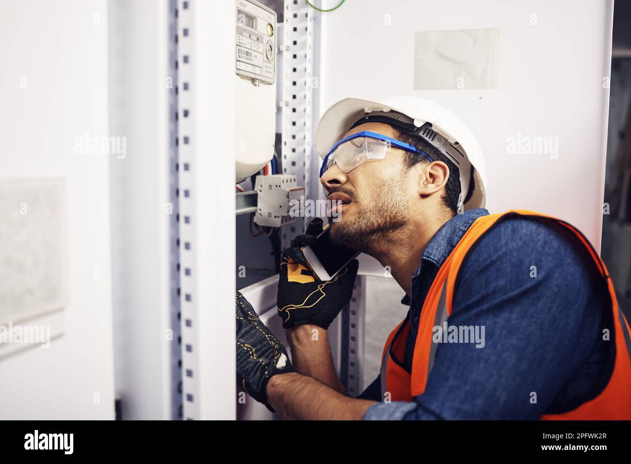 Man, phone call and engineering in control room, switchboard or ...