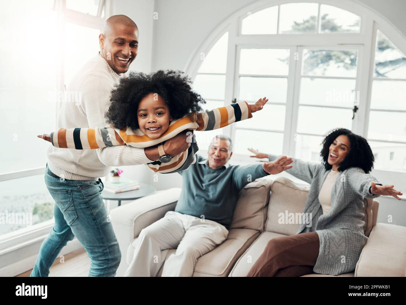 Airplane, father and girl in lounge, family an playing with love ...