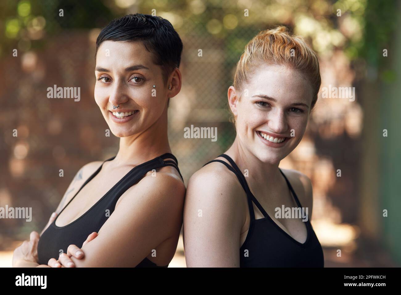 Shes got my back, and Ive got hers. Cropped portrait of two attractive ...
