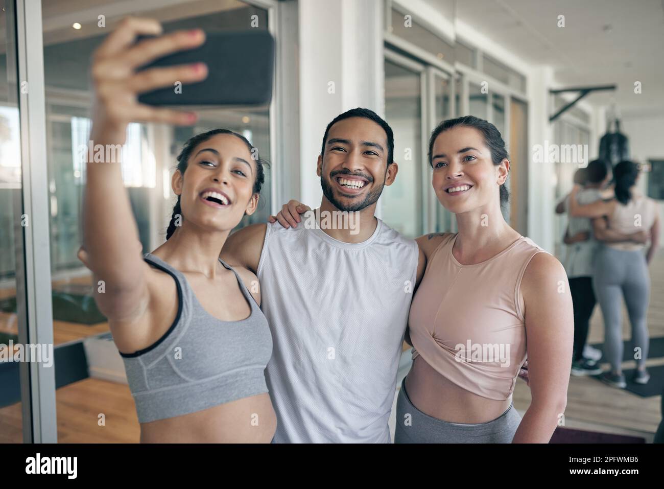 Sending some fitness motivation your way. three young athletes taking a ...