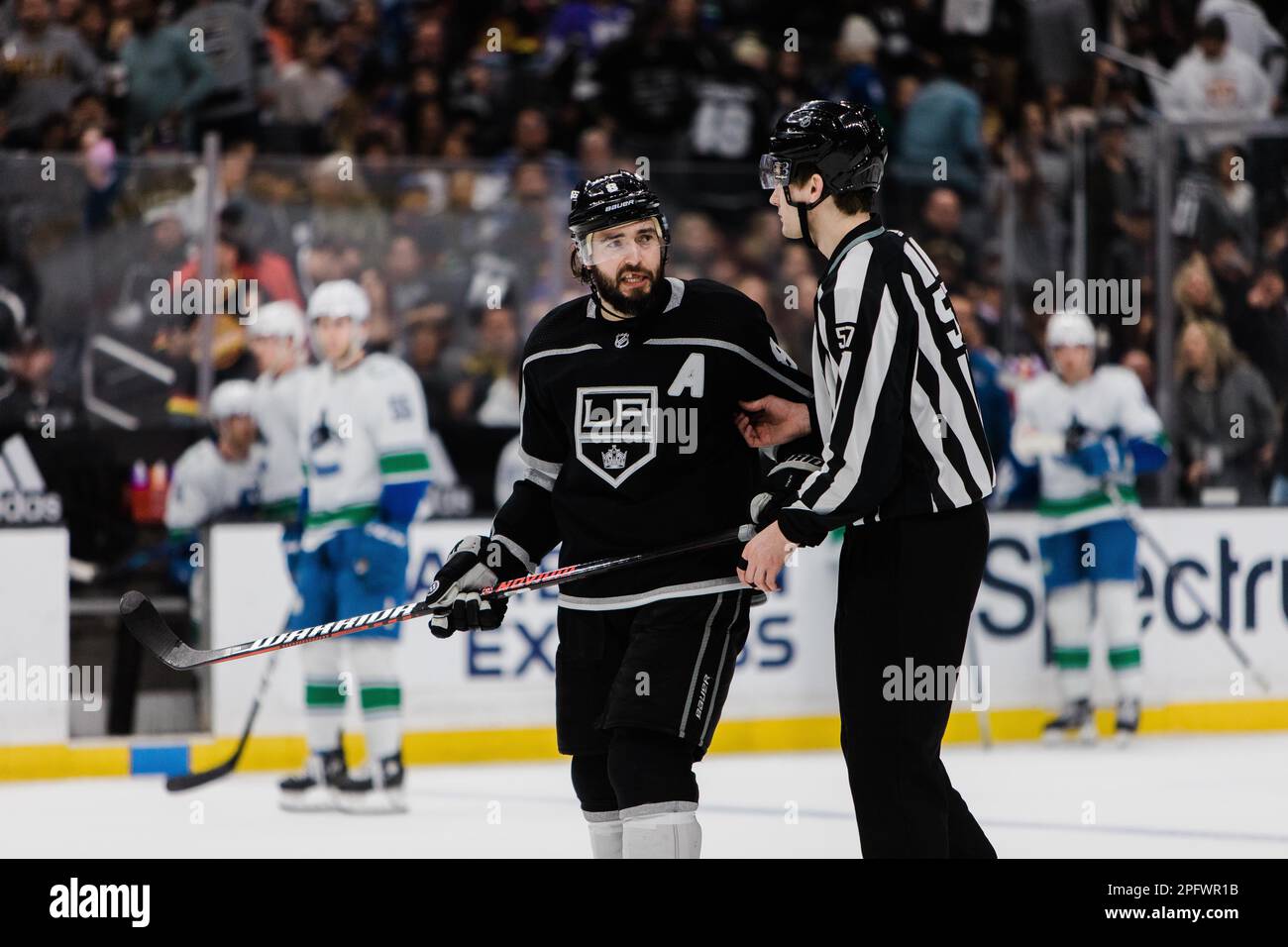 Los Angeles, California, USA. 18th Mar, 2023. Referees break-up a fight ...