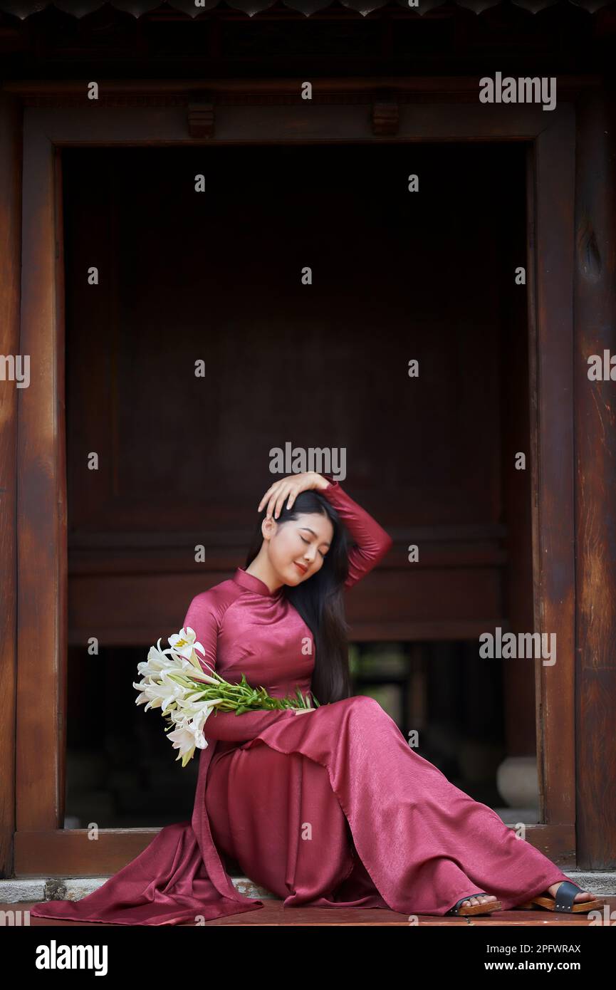 Ho Chi Minh city, Viet Nam: Portrait of a Vietnamese girl wearing a ...
