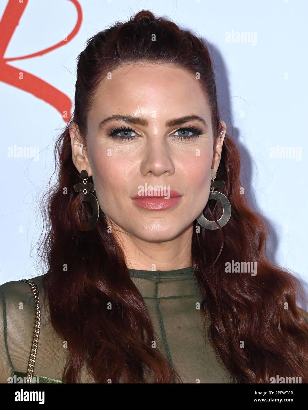 Courtney Hope arriving at the 50th Anniversary of The Young and The ...