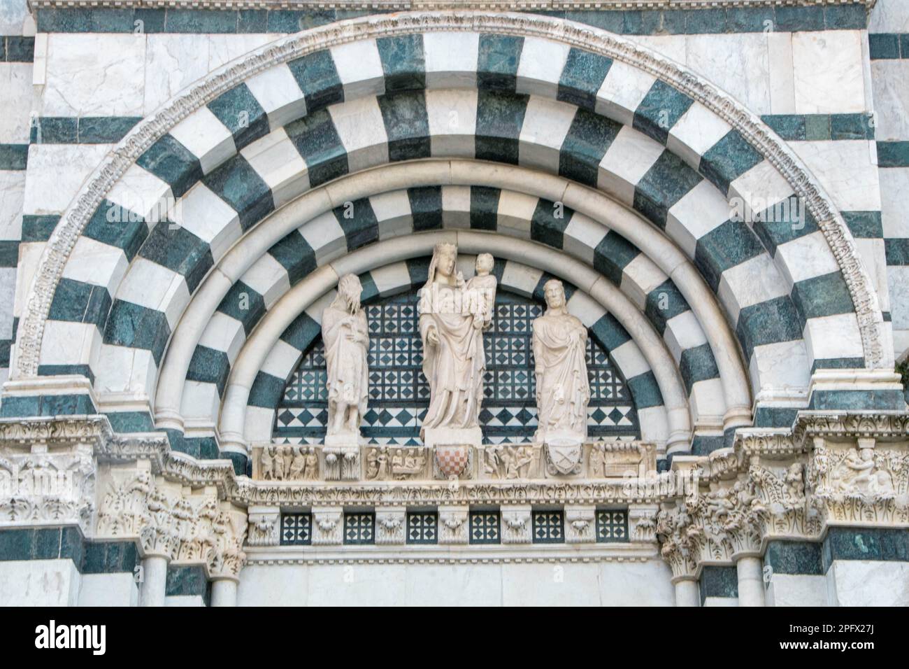 gothic sculpture on the facade of San Zeno cathedral, Pistoia Stock ...
