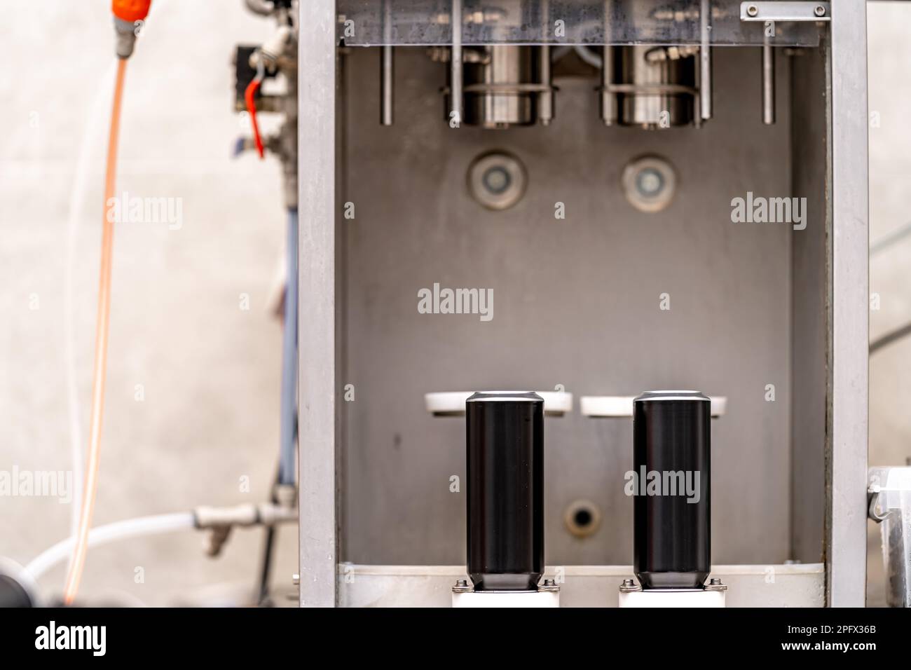 Can filling machine hi-res stock photography and images - Alamy