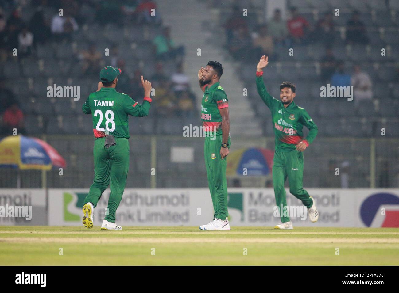 Ebadot Hossain (M) celebrates one of his fourth wockeyts along ...