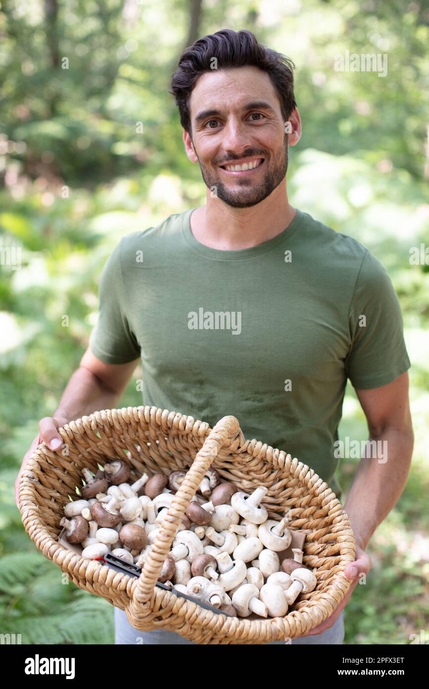 a man is going mushroom-hunting Stock Photo - Alamy