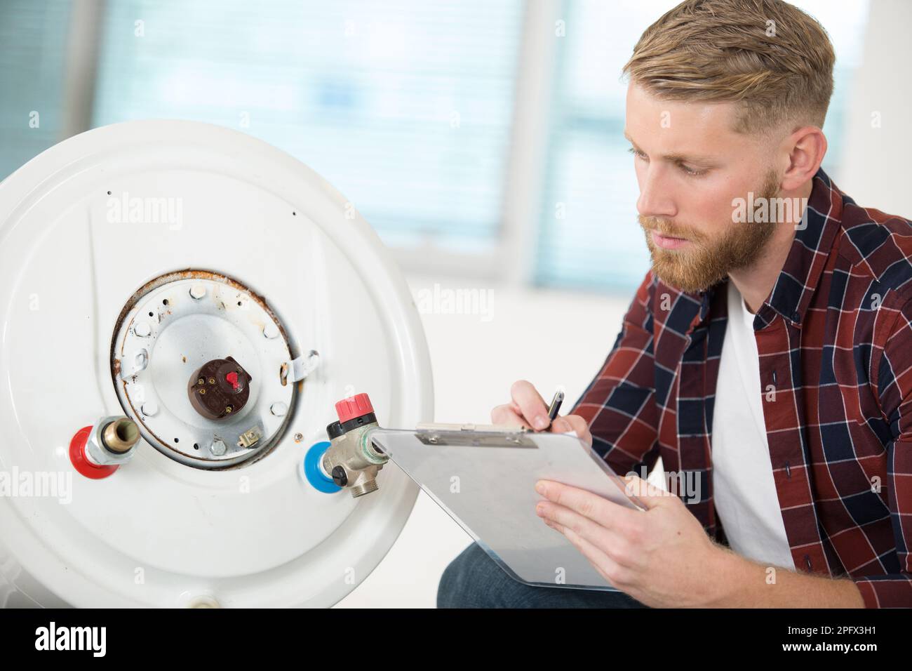 Man heater check hi-res stock photography and images - Alamy