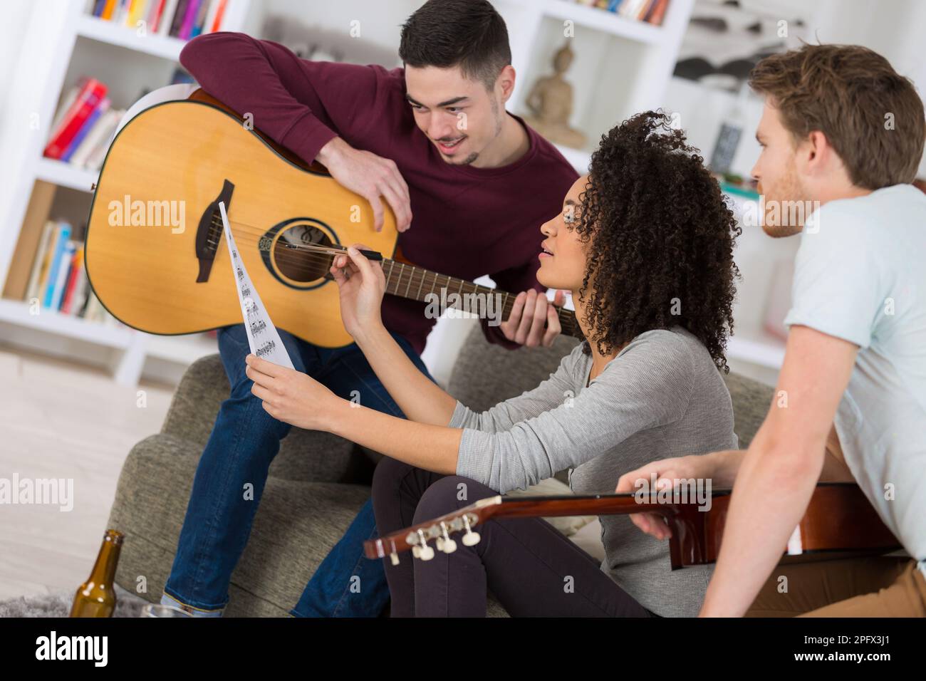 band music playing a song in a recording studio Stock Photo - Alamy