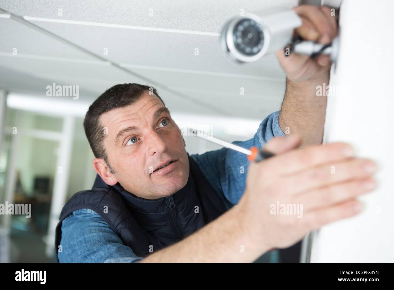 Modern cctv on ceiling hi-res stock photography and images - Alamy