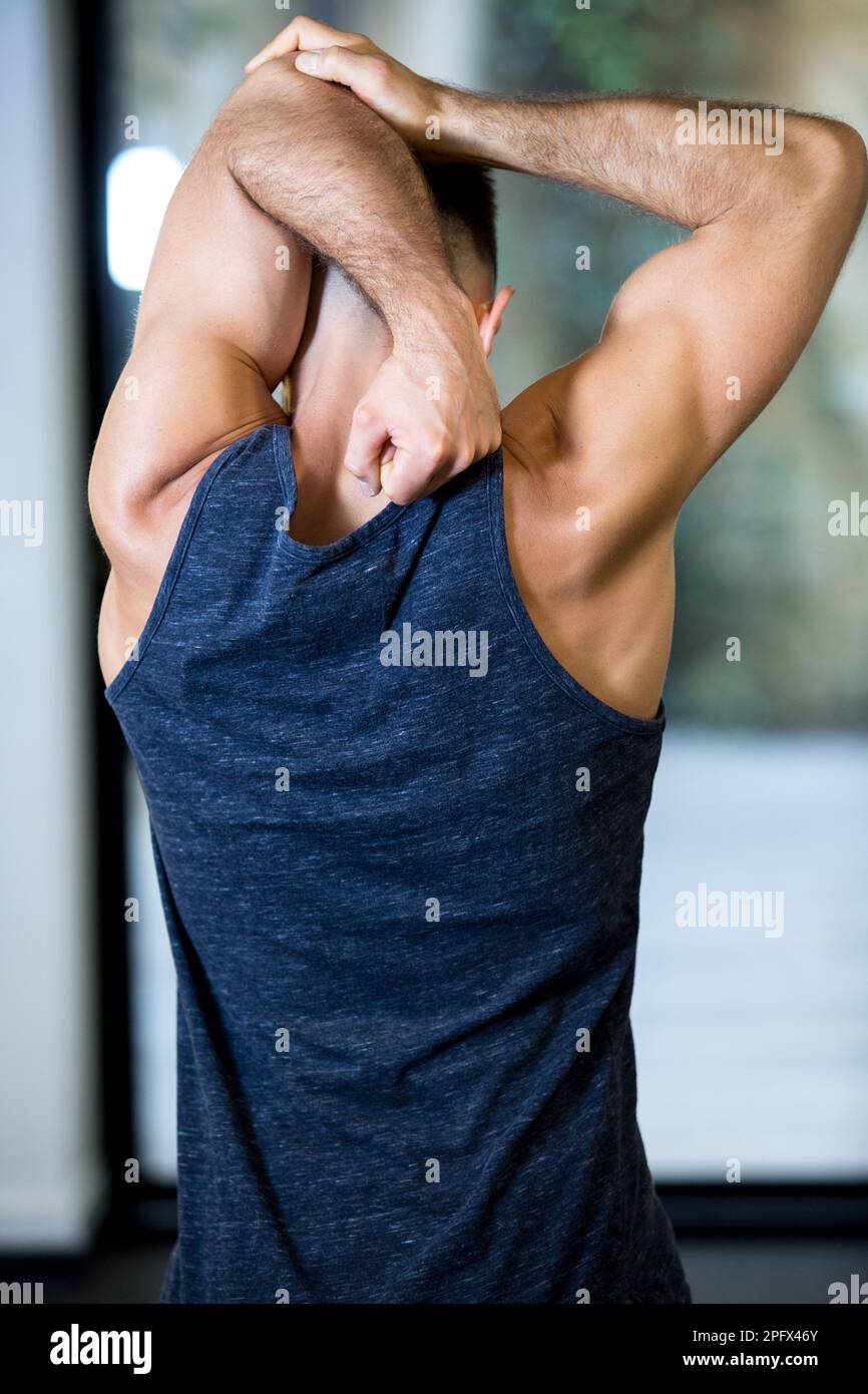 man showing of the muscle on his back Stock Photo - Alamy