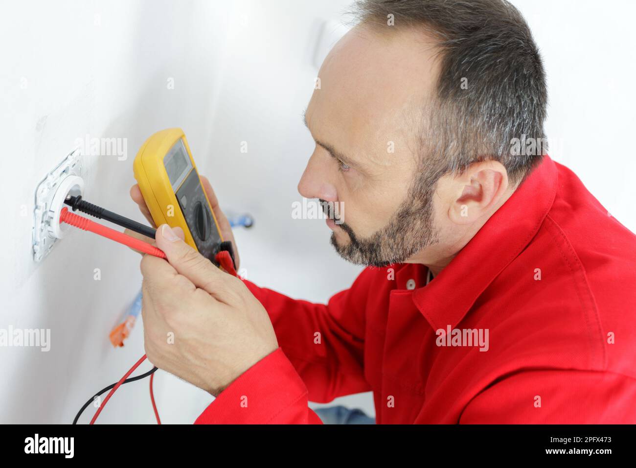 man checks electrical system in the factory Stock Photo - Alamy