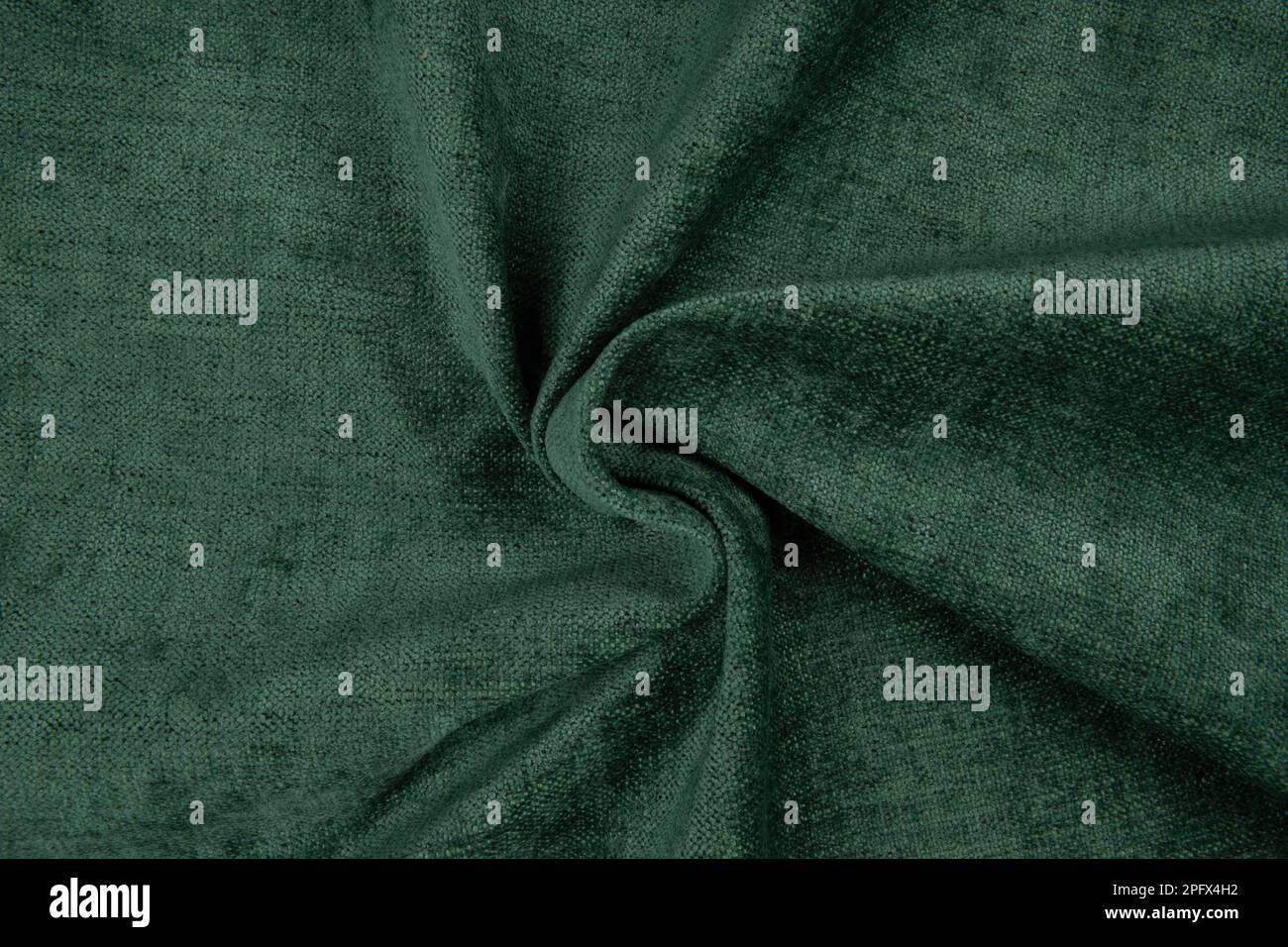 Green fabric texture - top view and close-up of a piece of crushed and ...