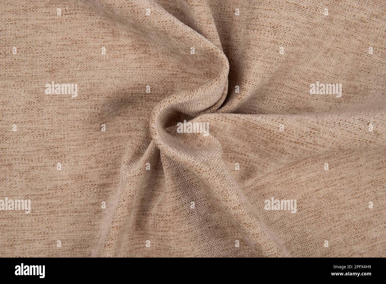 Brown fabric texture - top view and close-up of a piece of crushed and ...