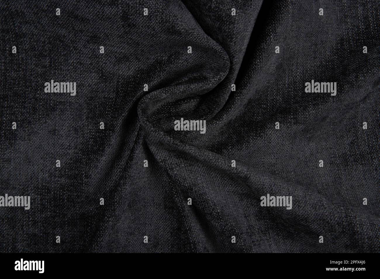 Black fabric texture - top view and close-up of a piece of crushed and ...