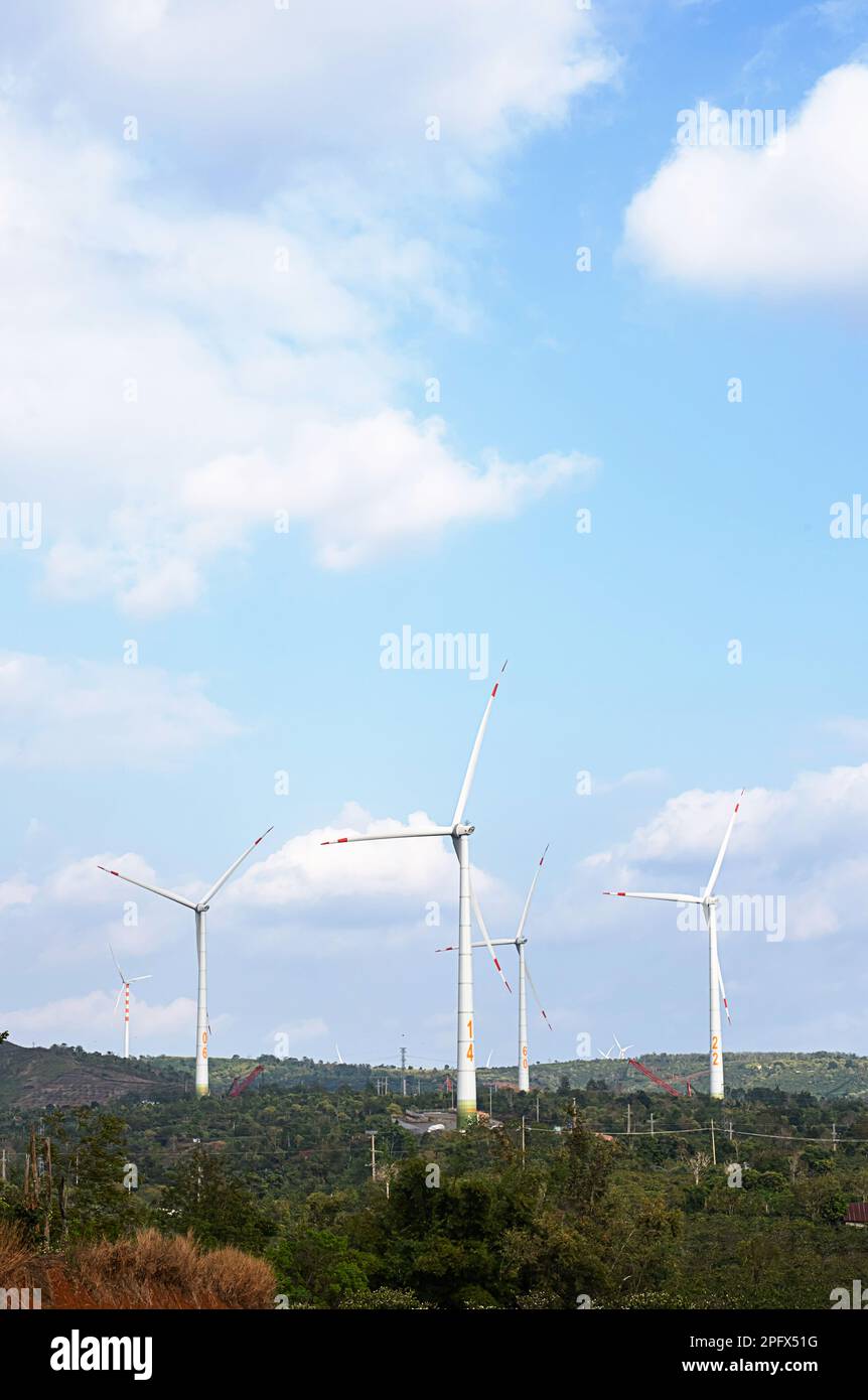 Wind generator turbines at wind farm. Alternative energy concept Stock ...