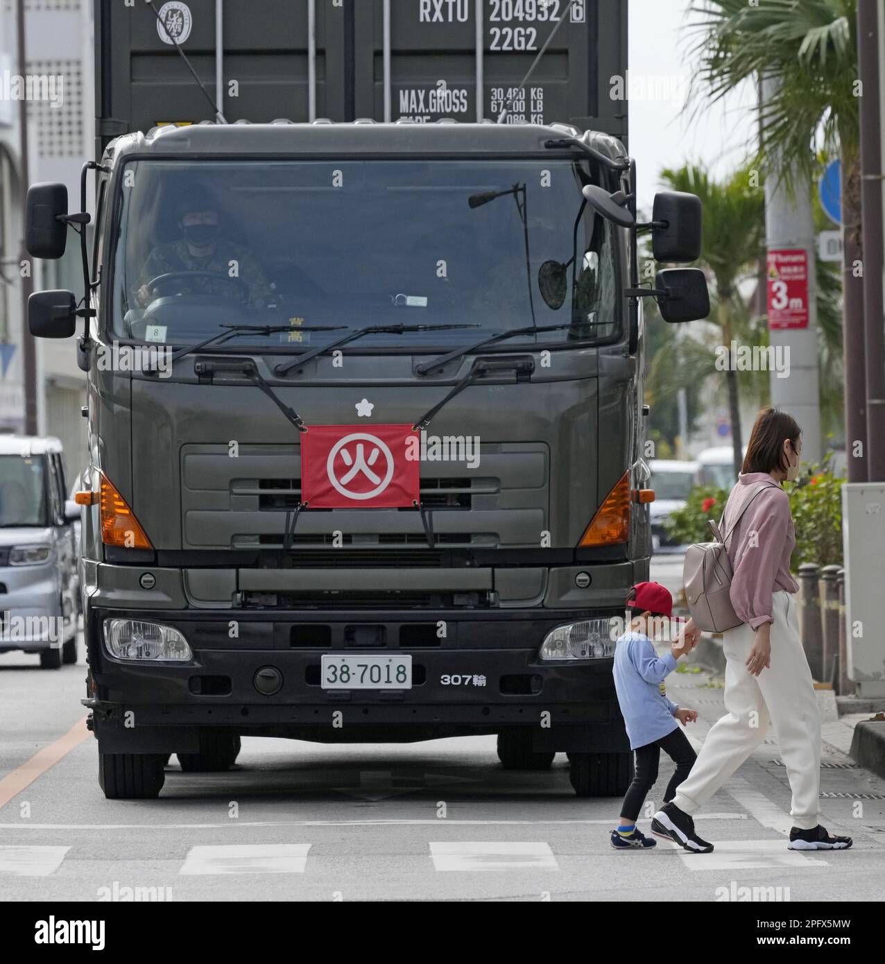 A Japan Ground Self-Defense Force vehicle carrying ammunition including ...