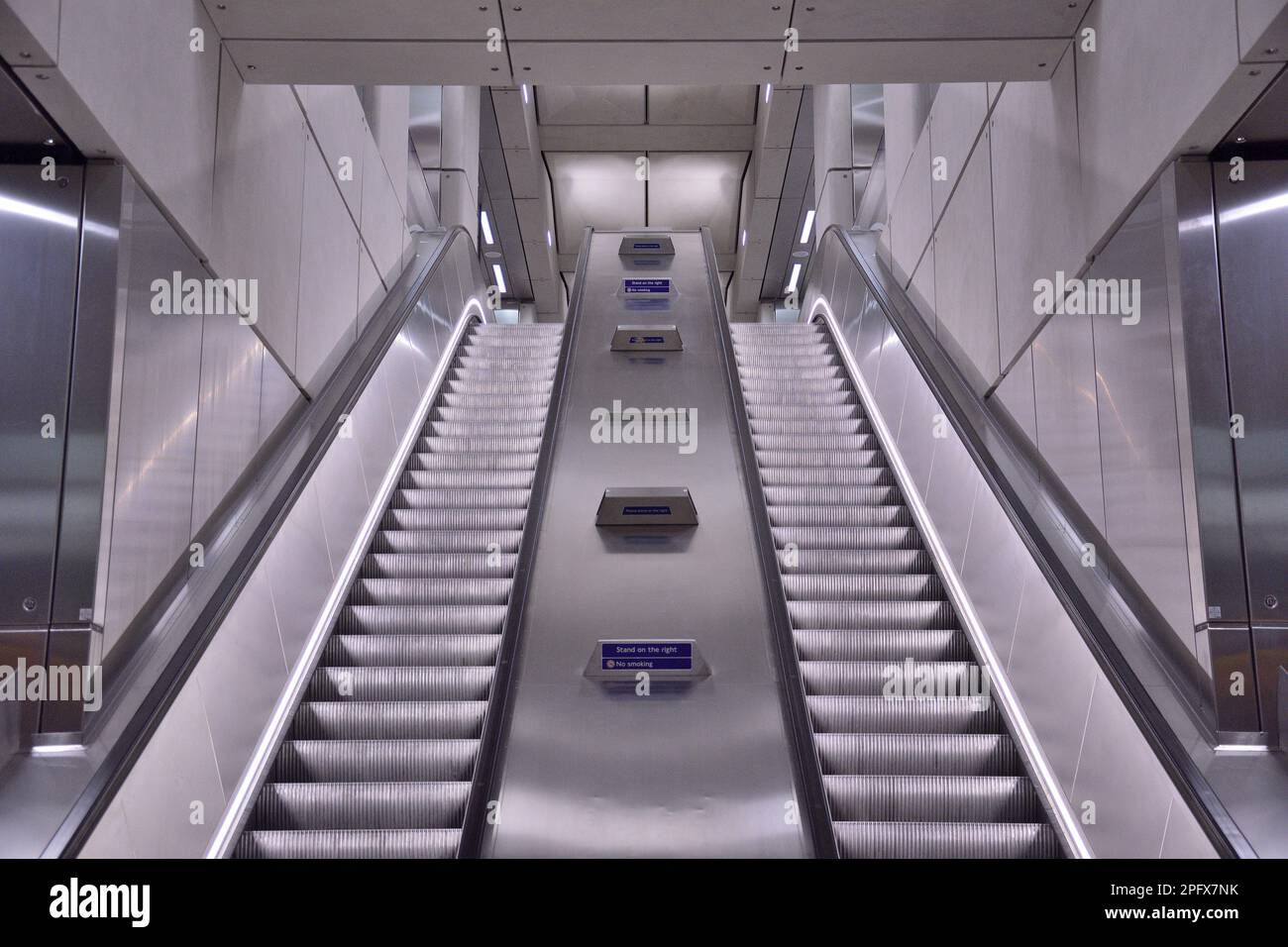 Escalator moving staircase Stock Photo - Alamy