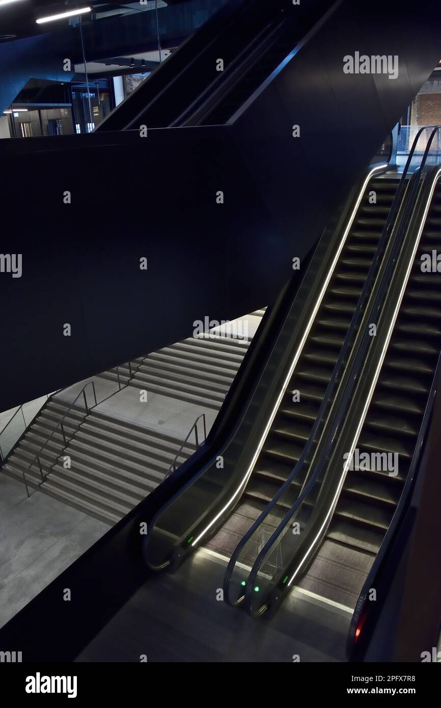 Escalator moving staircase Stock Photo - Alamy