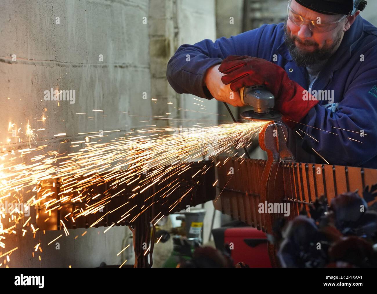 Metal sculptor Craigie Ross puts the finishing touches to another huge ...