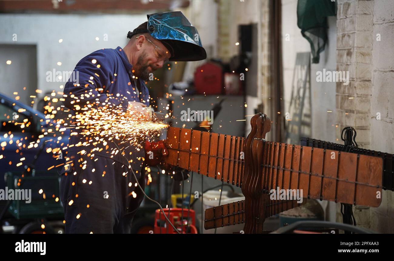 Metal sculptor Craigie Ross puts the finishing touches to another huge ...