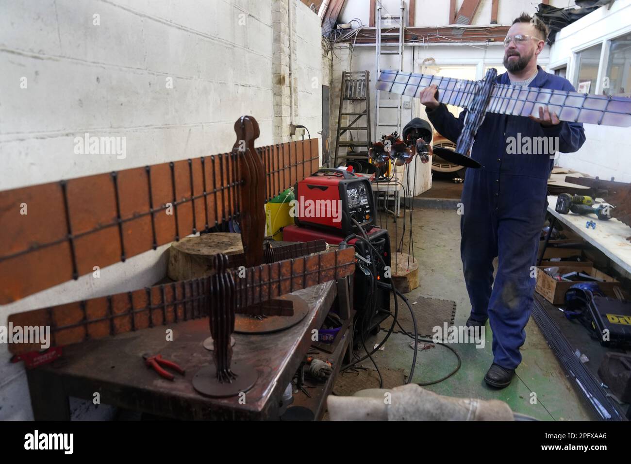 Metal sculptor Craigie Ross puts the finishing touches to another huge ...