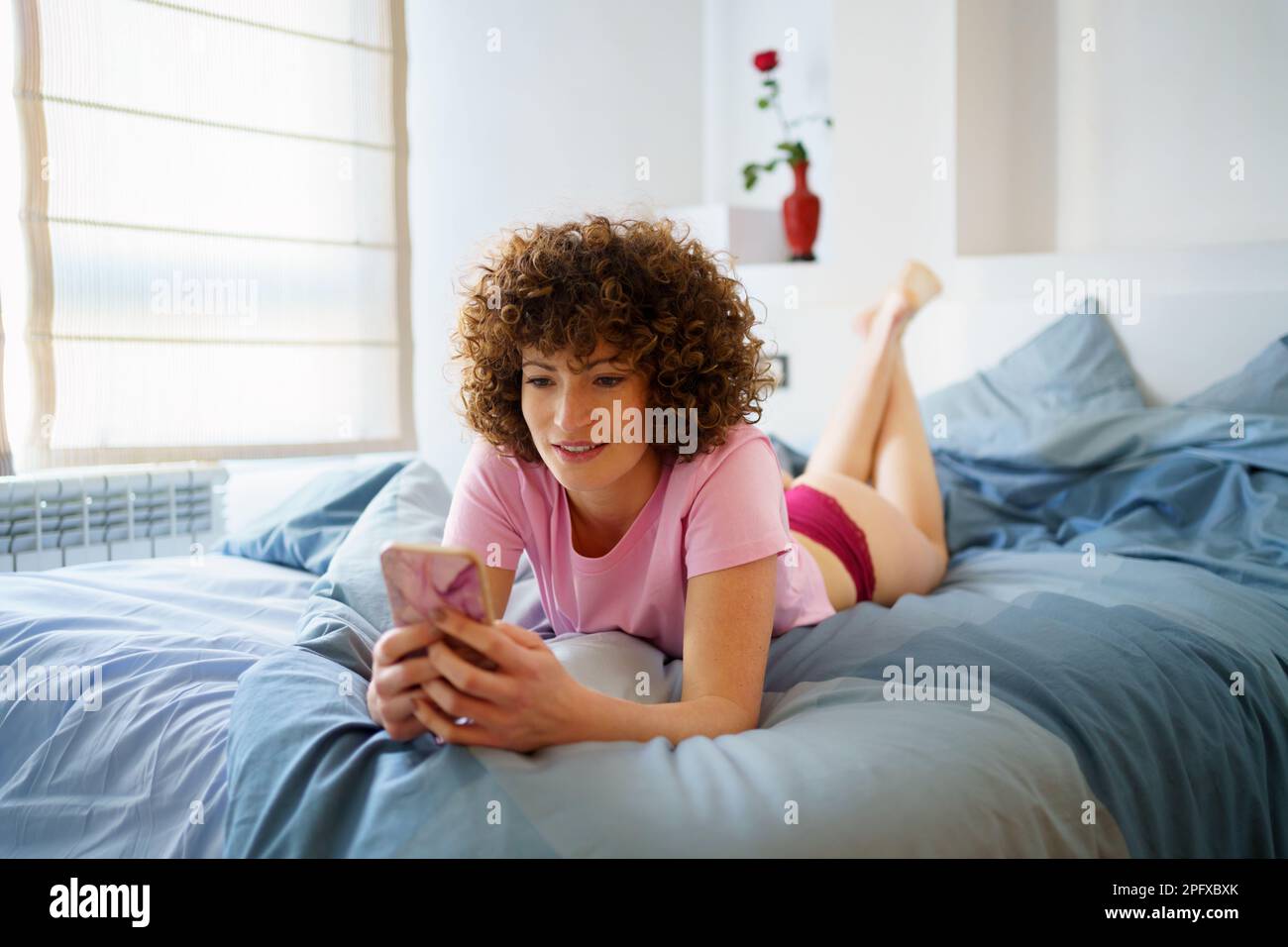Full body woman using app on phone hi-res stock photography and images ...