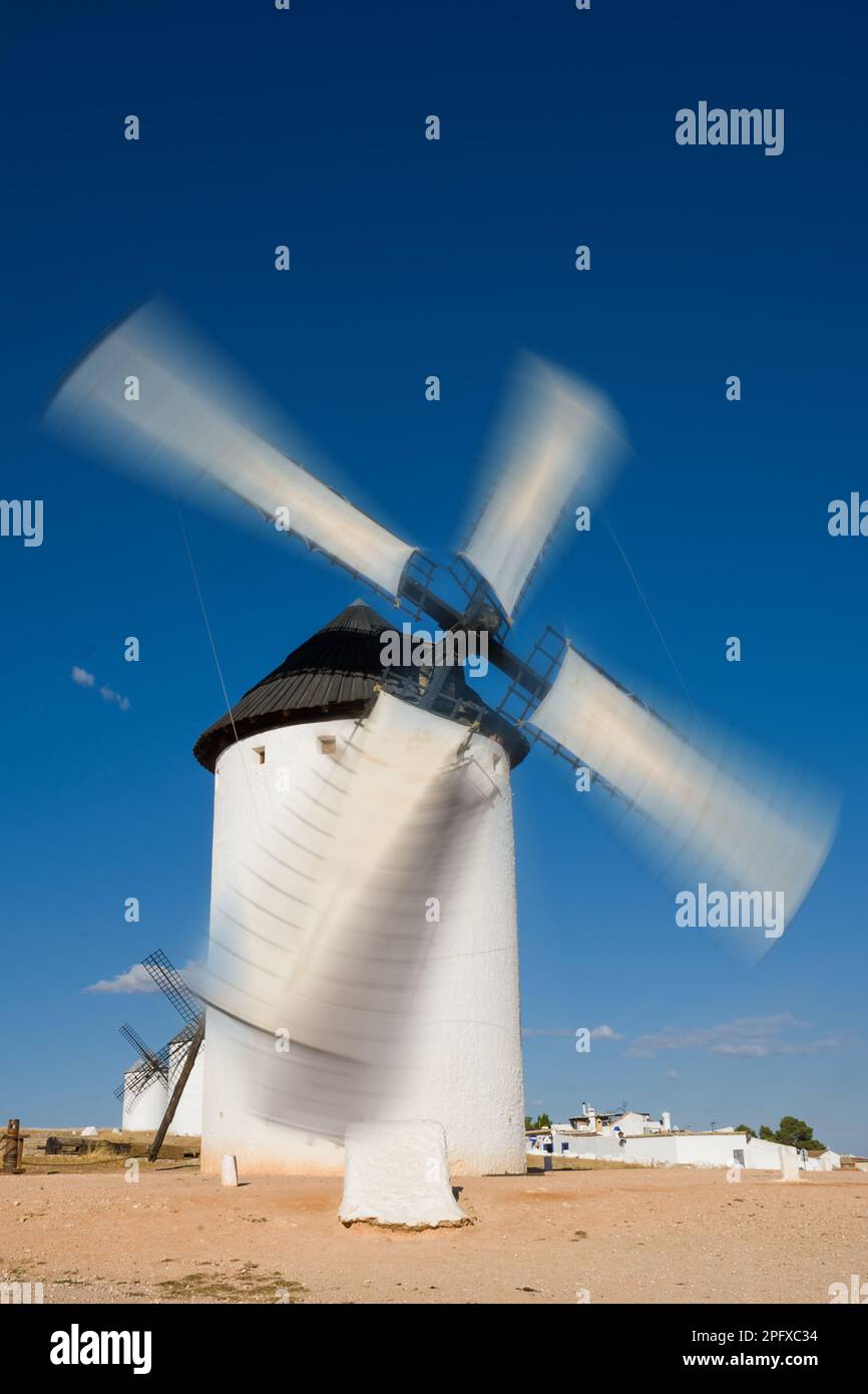 Ancient windmill in Campo de Criptana with moving blades, Spain ...