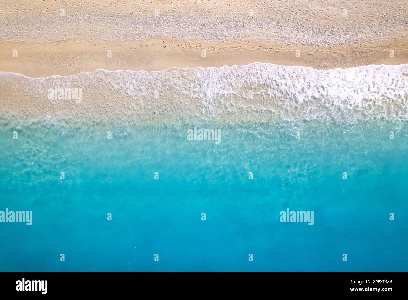 Aerial top down drone shot above an empty beach Stock Photo - Alamy