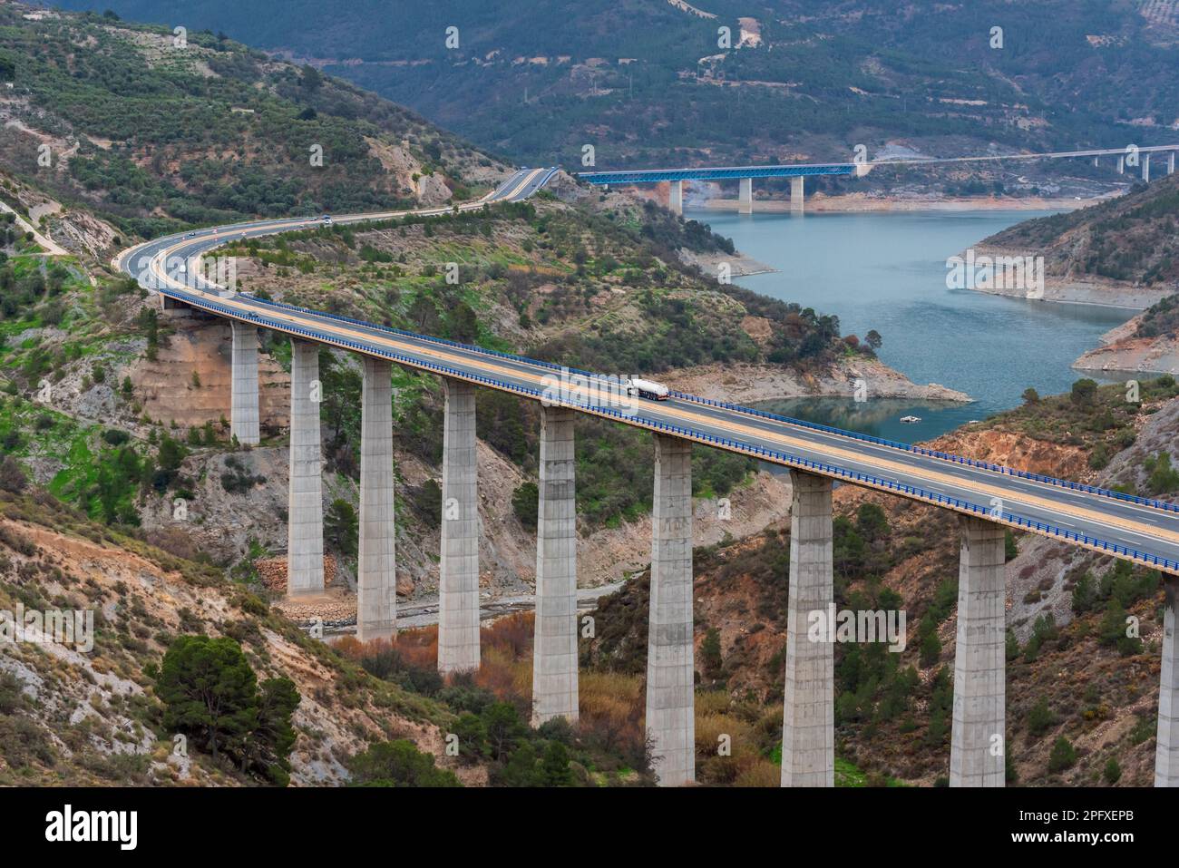 Landscape of a swamp with a road that surrounds it, with a long and ...
