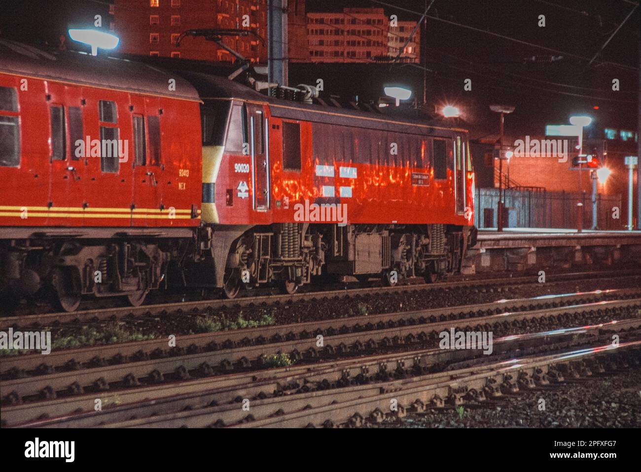 90020 at Doncaster on a southbound East Coast Royal Mail train. Night ...