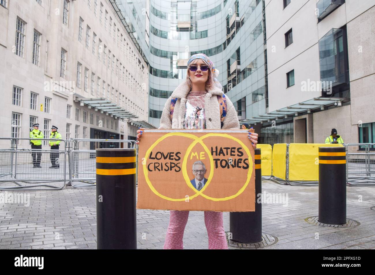 London, UK. 18th March 2023. A protester shows solidarity with Gary ...