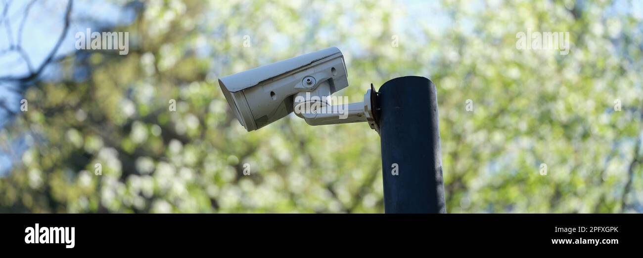 Mini cctv cameras installed on pillar outside Stock Photo - Alamy