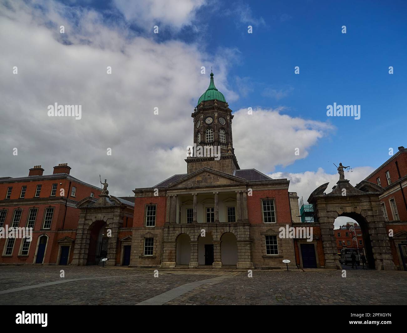 historic building with red bricks and a tower in the city center of ...