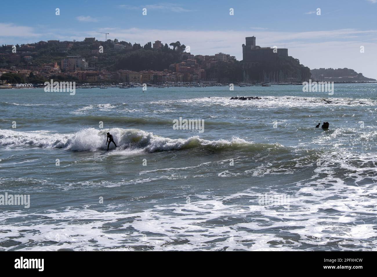 Young athletic surfers ride the wave with splashes. Jailbreaks surf ...